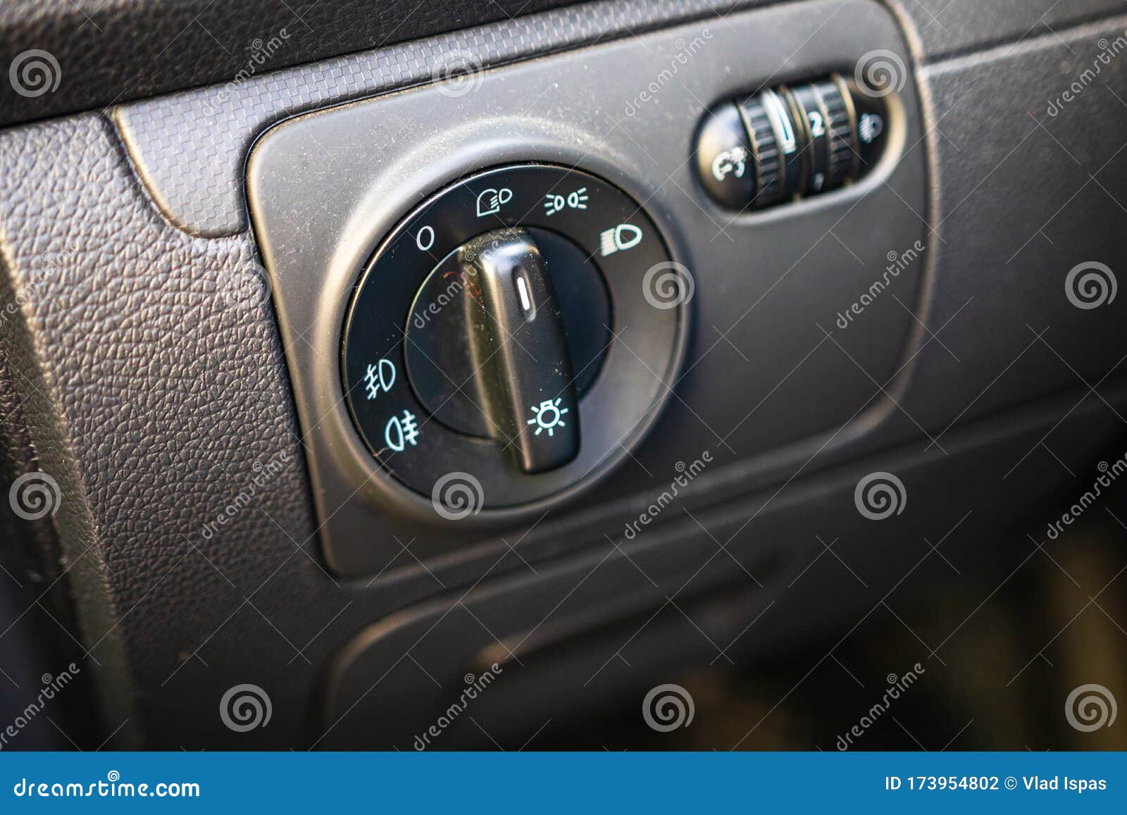 The Dashboard of Dusty Car`s Interior is Black with a Dipped Headlamp ...