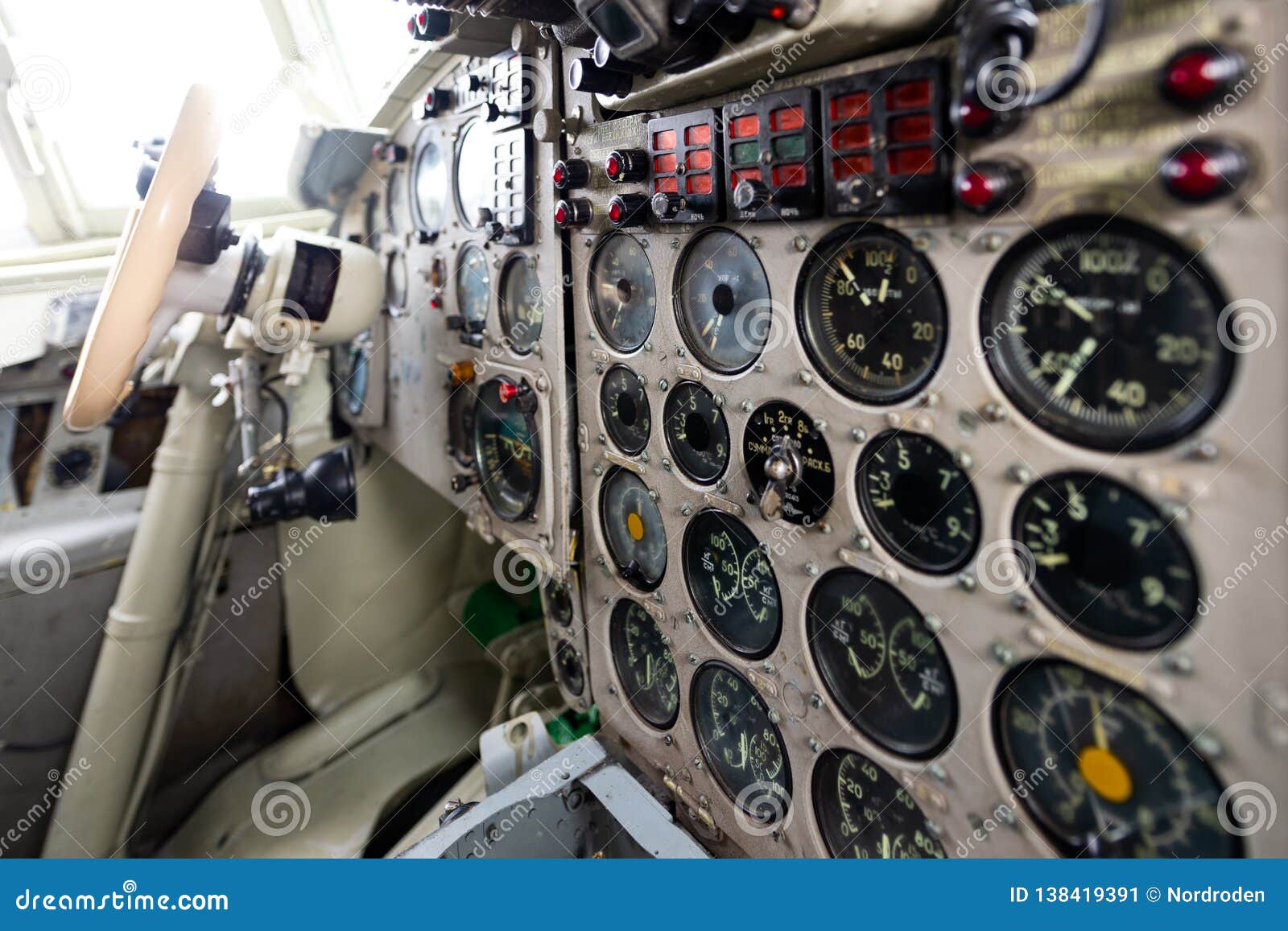 Dashboard of an Old Airplane. Many Analog Pointers, Buttons and ...