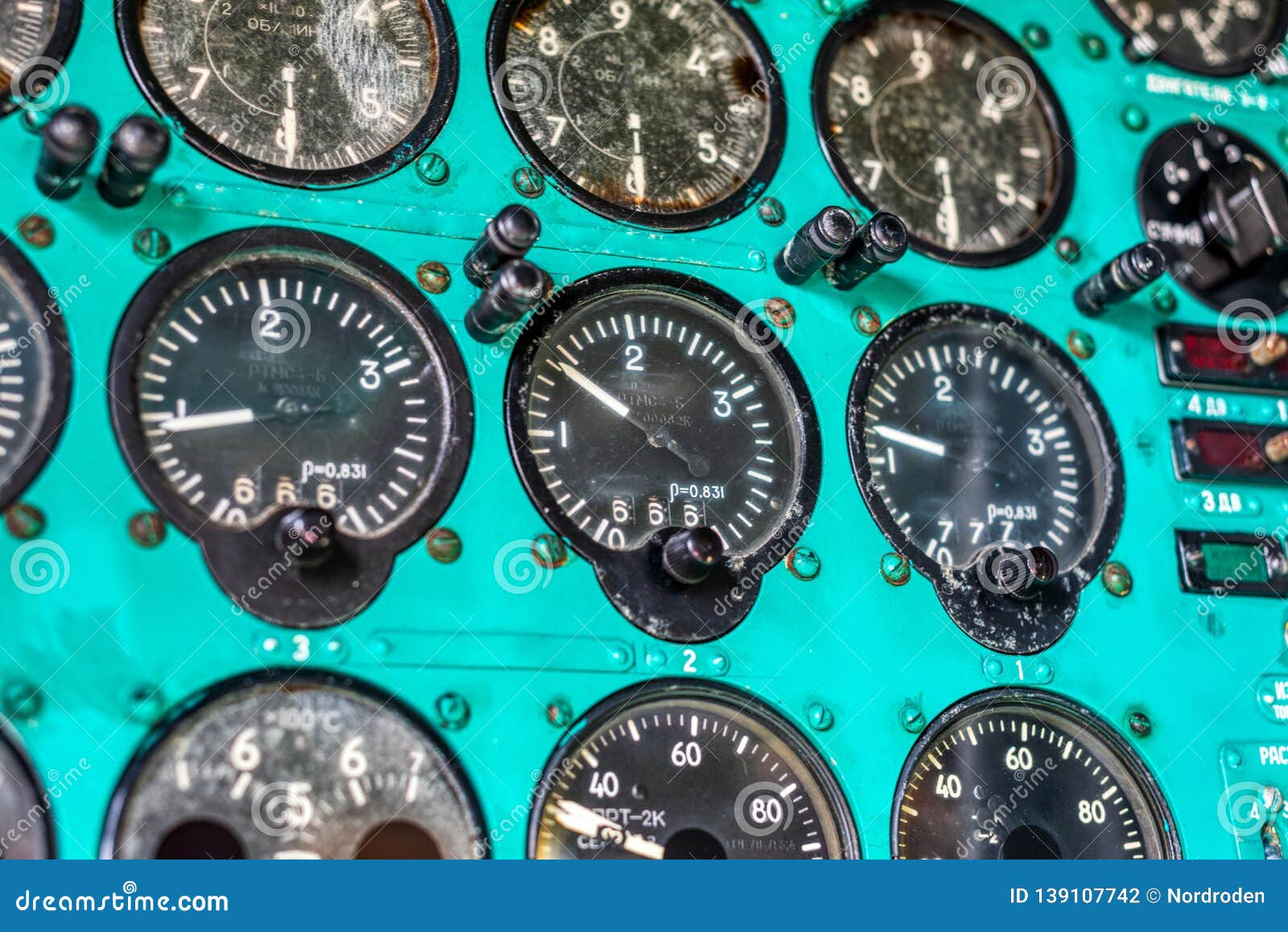 Dashboard of an Old Airplane. Many Analog Pointers, Buttons and ...