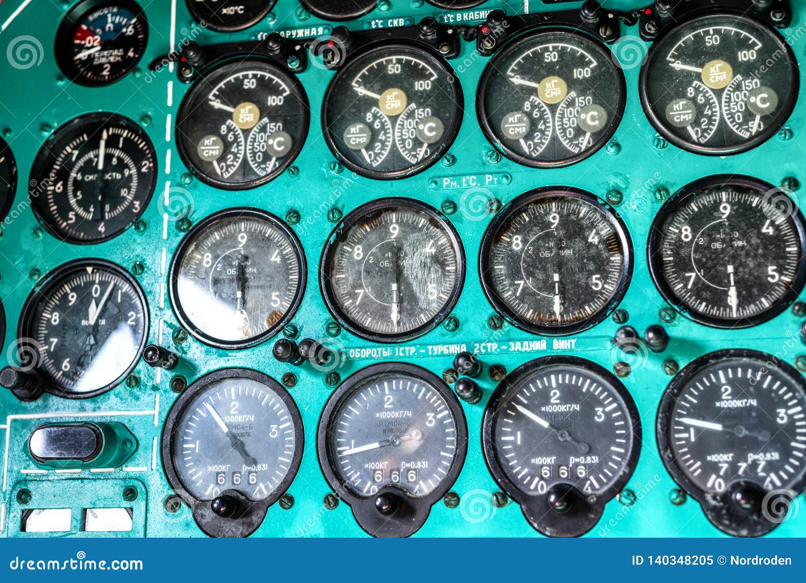 Dashboard of an Old Airplane. Many Analog Pointers, Buttons and ...