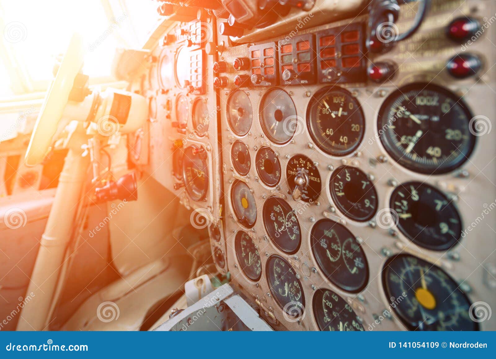 Dashboard of an Old Airplane. Many Analog Pointers, Buttons and ...
