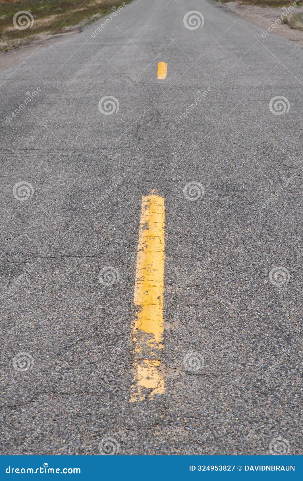 Dashed Yellow Line on Rough Road Stock Image - Image of country, line ...