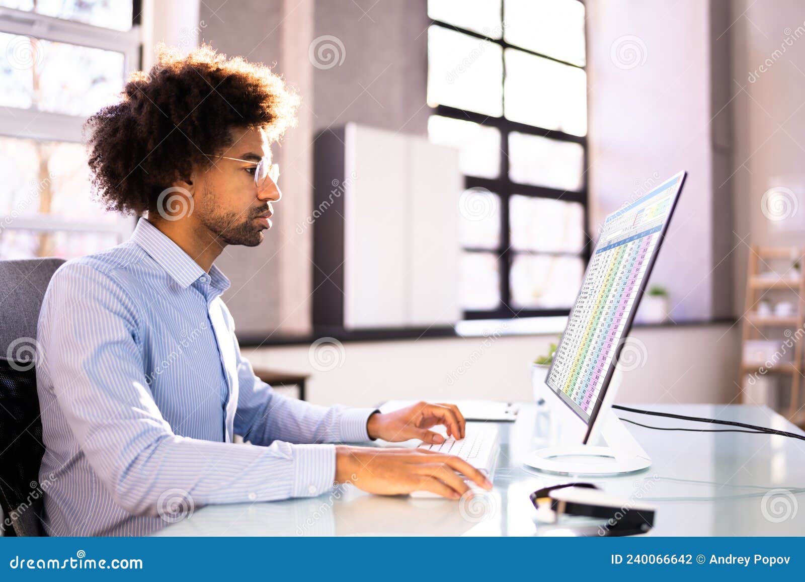 Data Analyst African Man Using Spreadsheet Stock Photo - Image of ...