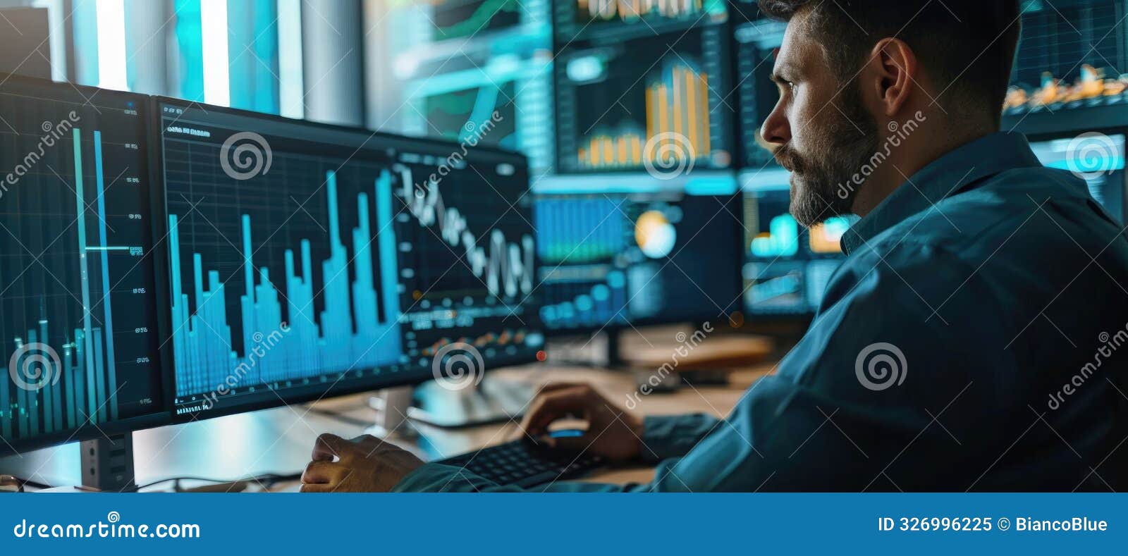 A Data Analyst is Busy at Work in the Office Analyzing Graphs and ...