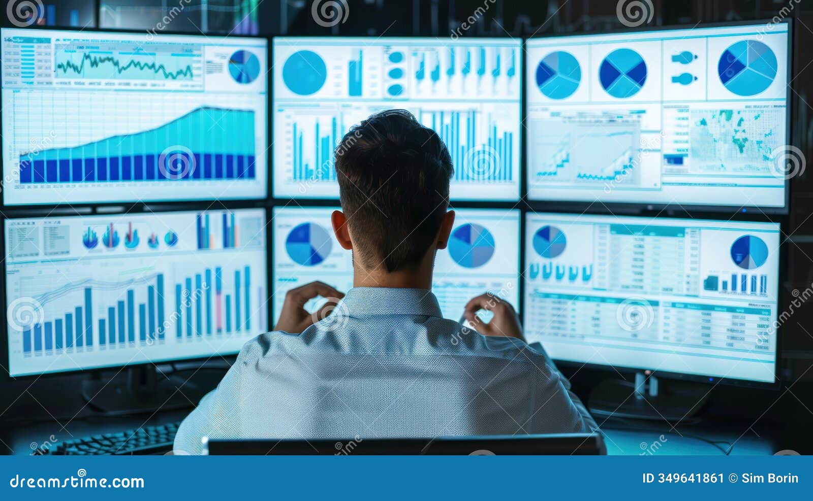 A Data Analyst Working With Multiple Monitors Showing Various Stock
