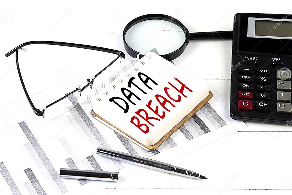 DATA BREACH Text on Notebook with Calculator on Diagram Background ...