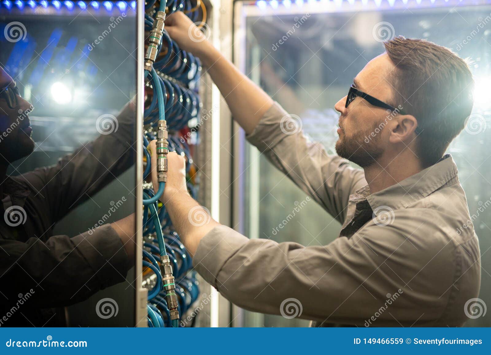 Data Center Engineer Examining Cables Stock Image - Image of repair ...