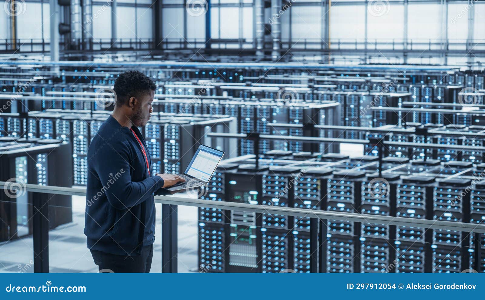 Data Center Engineer Using Laptop Computer. Server Farm Cloud Computing ...