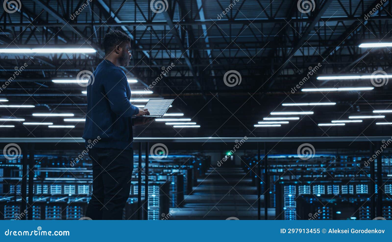 Data Center Engineer Using Laptop Computer. Server Farm Cloud Computing ...