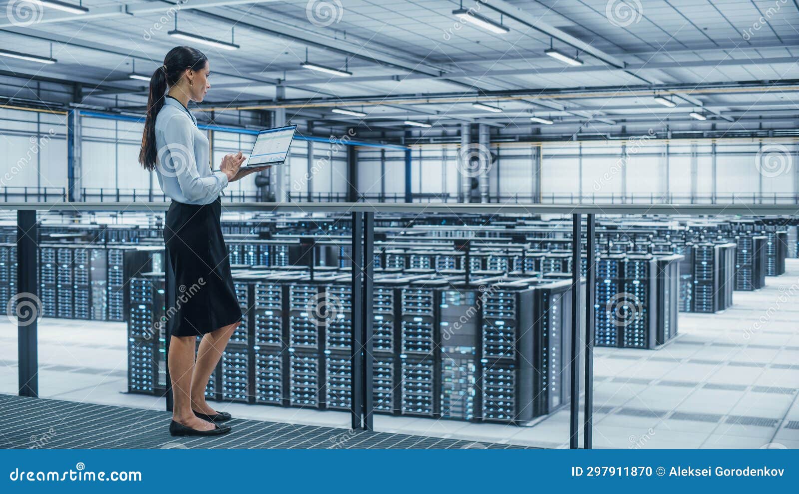 Data Center Engineer Using Laptop Computer. Server Farm Cloud Computing ...