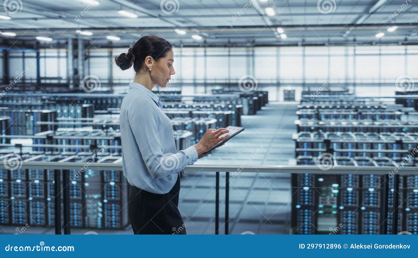 Data Center Engineer Using Tablet Computer. Server Farm Cloud Computing ...