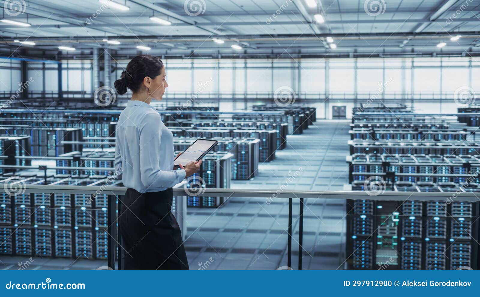 Data Center Engineer Using Tablet Computer. Server Farm Cloud Computing ...