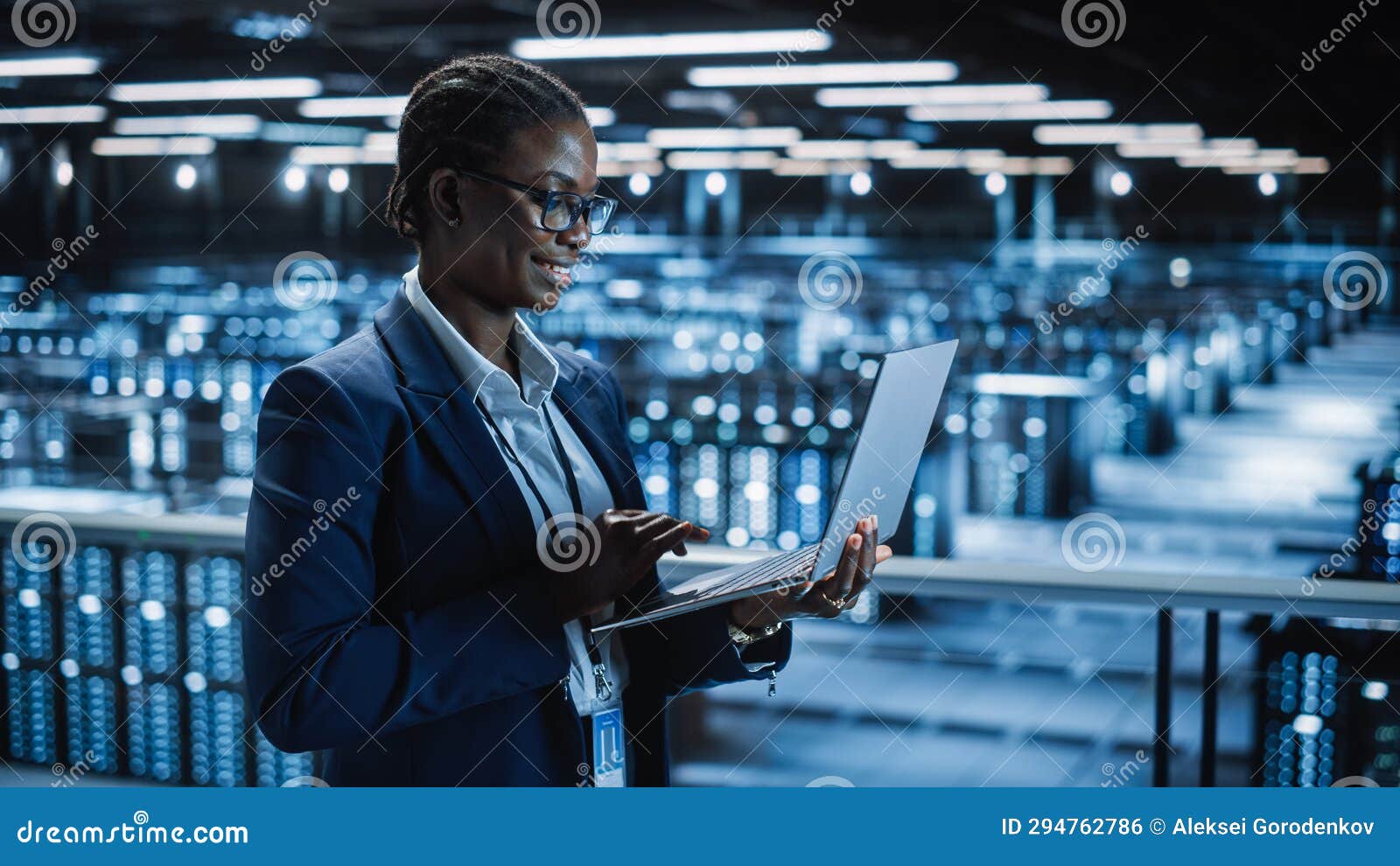 Data Center Female Programmer Using Laptop Computer, Maintenance it Specialist. in Cloud ...