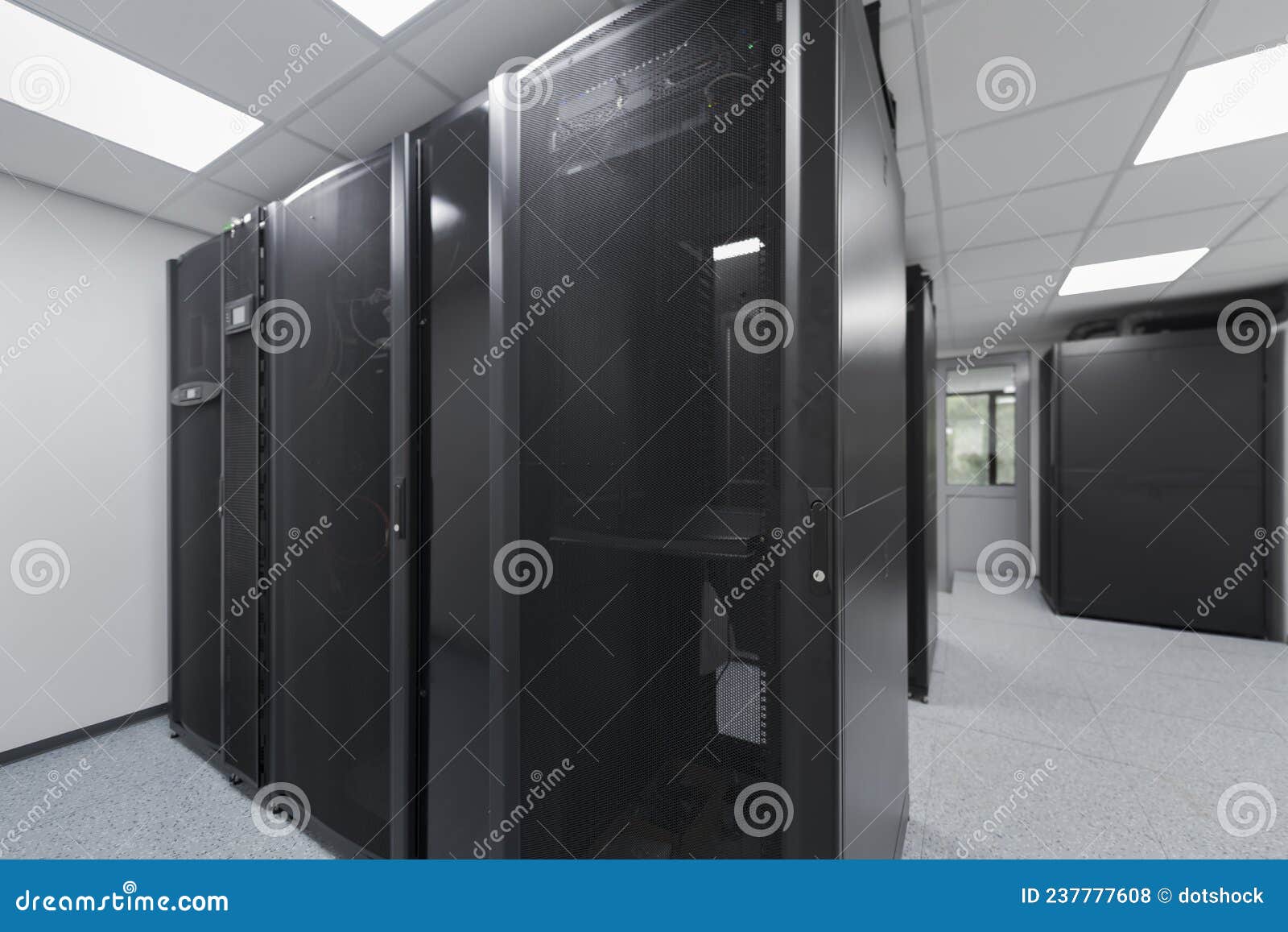 Data Center with Multiple Rows of Fully Operational Server Racks ...