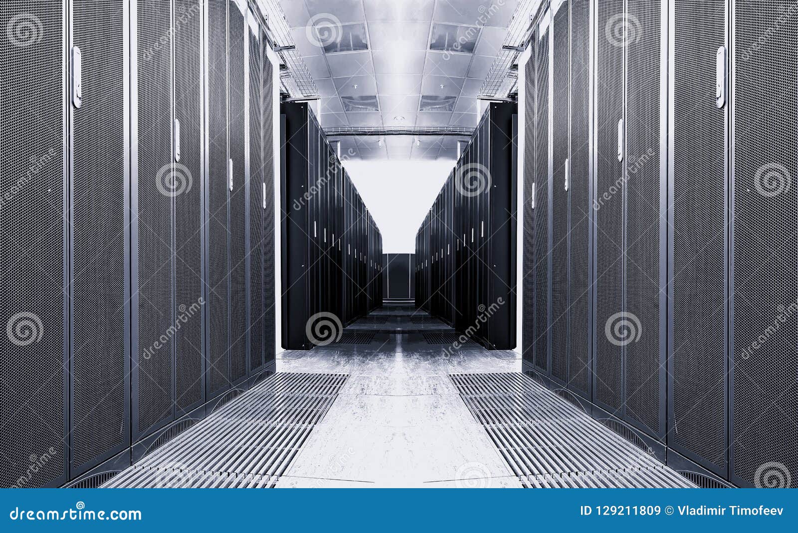 Data Center with Two Rows of Computers in White Room Stock Image ...