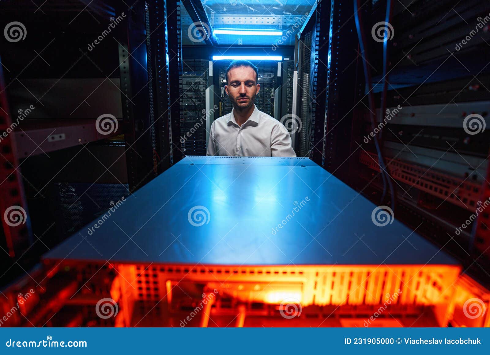 Data Center Worker Doing Maintenance of Computer Equipment Stock Photo ...