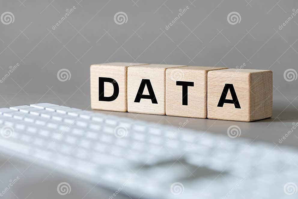 Data Concept. the Word DATA Written on Wooden Cubes on a Computer ...