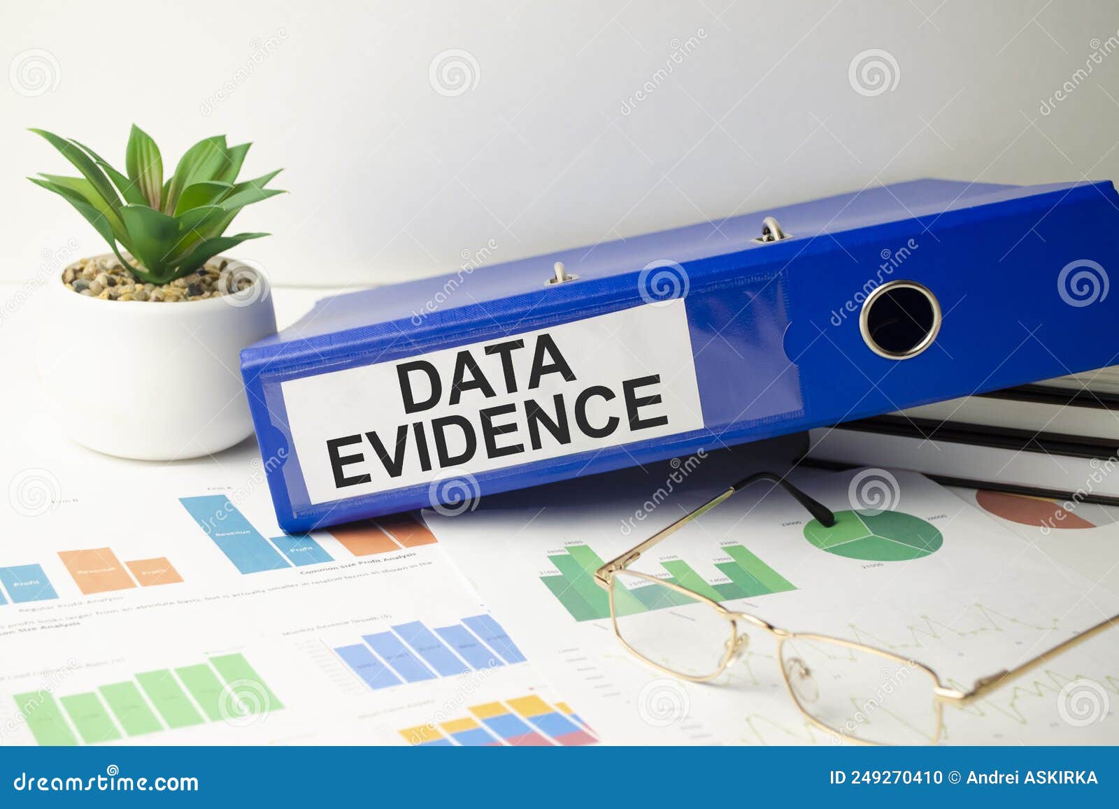 Data Evidence Words on Blue File Folder and Charts Stock Photo - Image ...