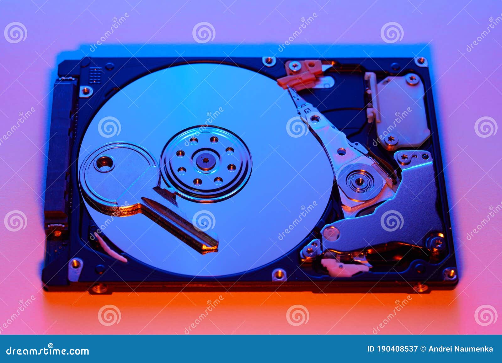 Data Security Concept. Key on Spindle of a Hard Disk Drive. Opened Hard ...