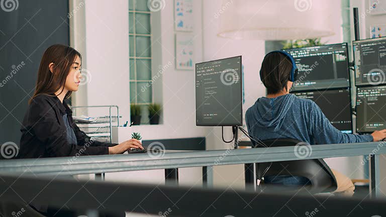 Database Programer Writing Source Code With Coding Language In It