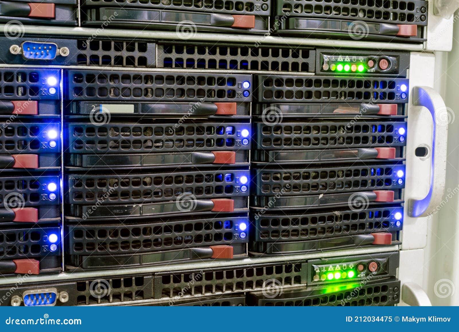 Powerful Computers Work At The Data Center Racks Behind A Glass Wall. Bright Indication Of ...