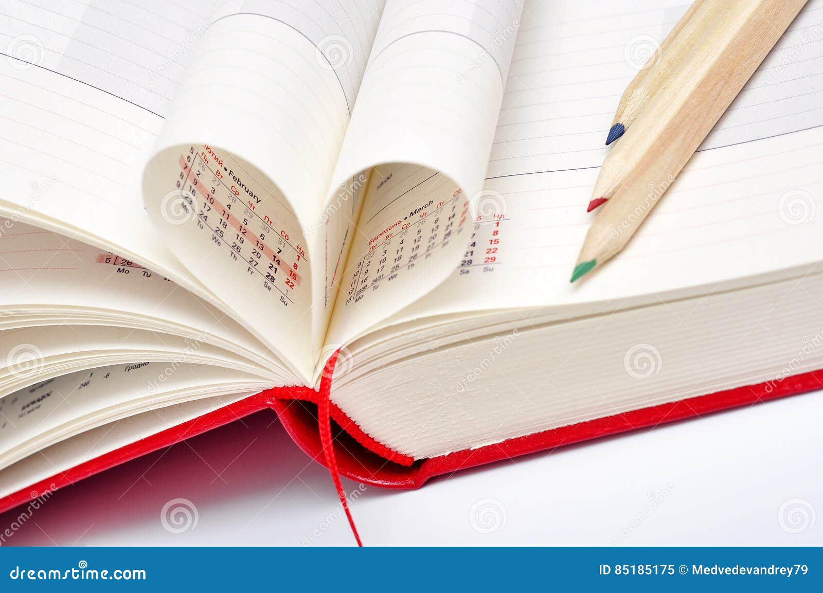 Date in Red Notebook, Heart of Pages and Color Pencils. Stock Image ...