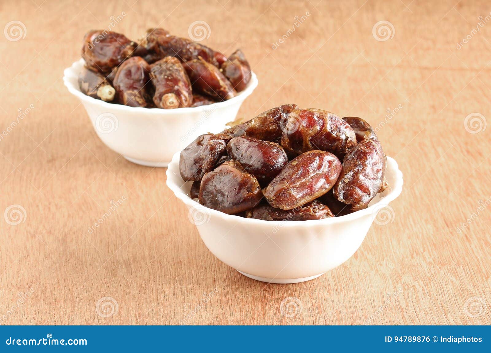Dates in Bowls stock photo. Image of fiber, front, chewy - 94789876