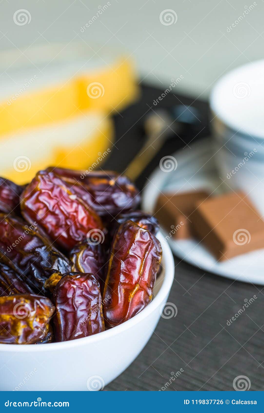 Dates fruit in small bowl stock photo. Image of culture - 119837726