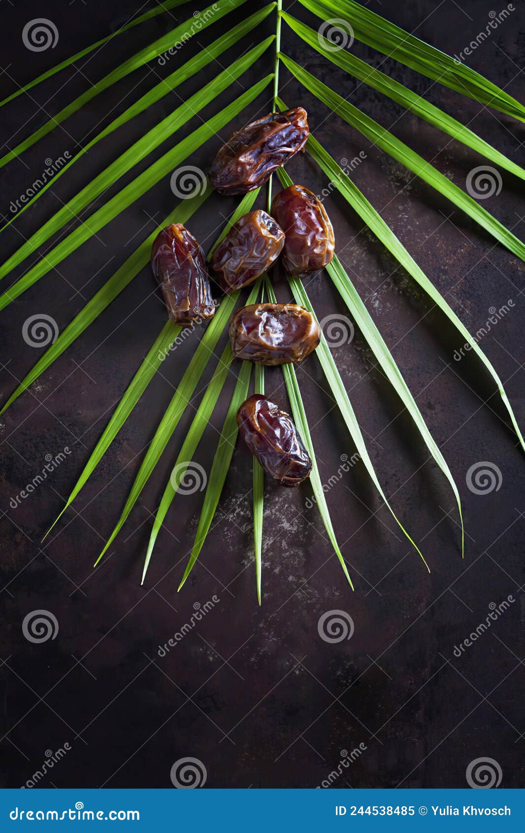 Dates and Leaves on Black Background, Top View. Stock Image - Image of ...