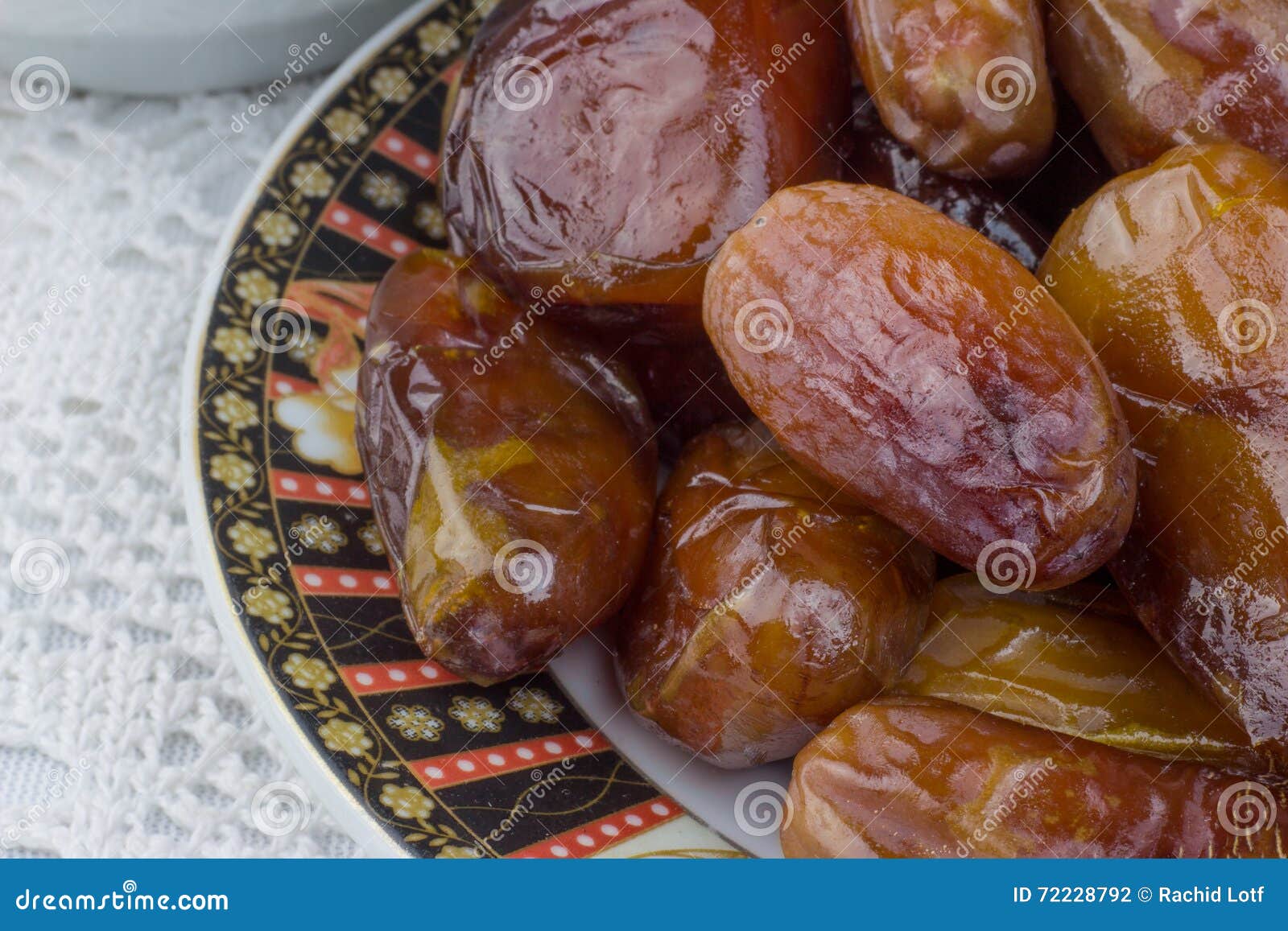 Dates on a plate stock photo. Image of food, details - 72228792