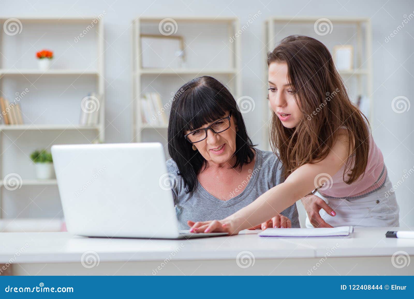 The Daughter Explaining To Mom How To Use Computer Stock Photo - Image ...