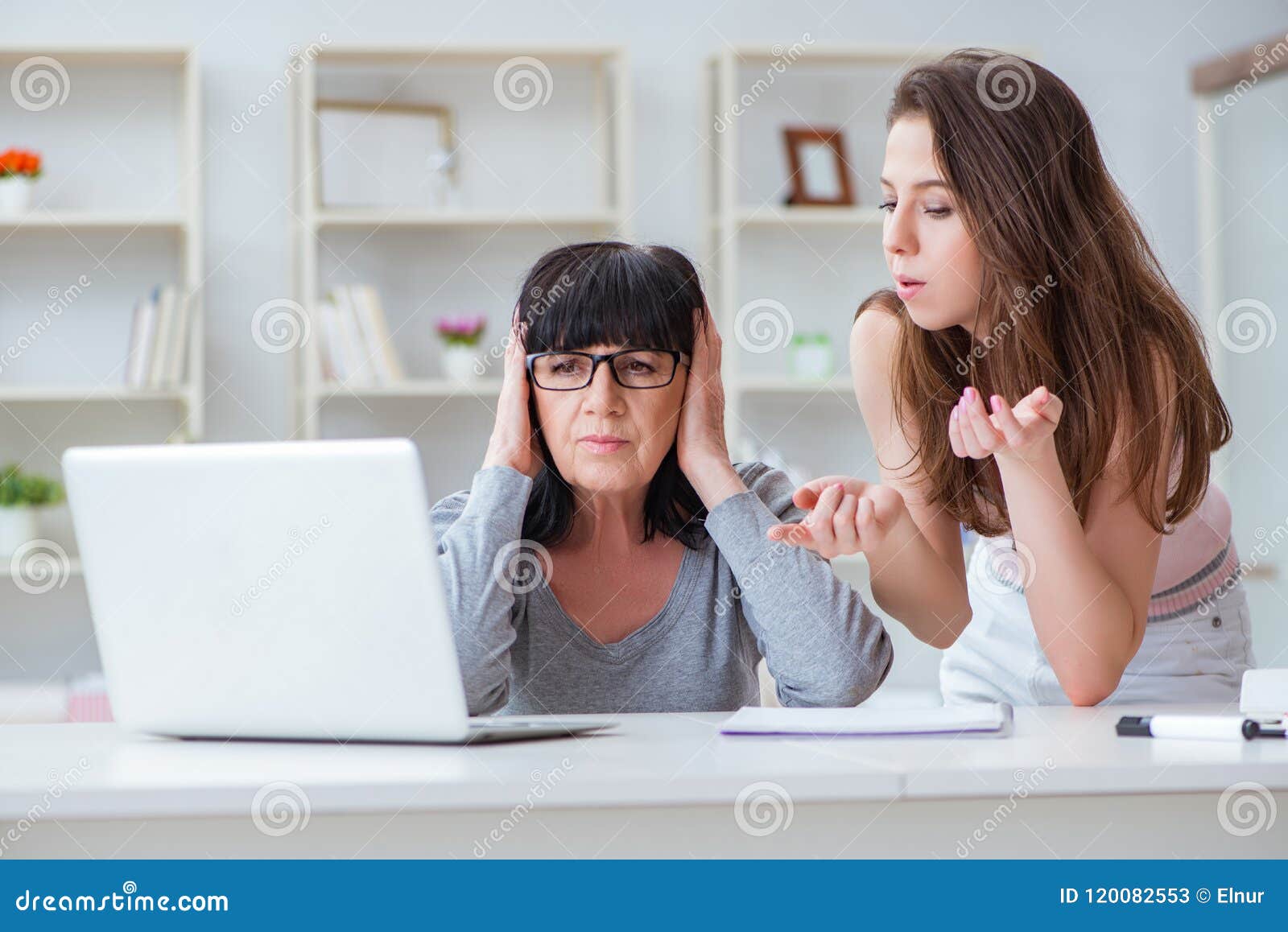 The Daughter Explaining To Mom How To Use Computer Stock Image - Image ...