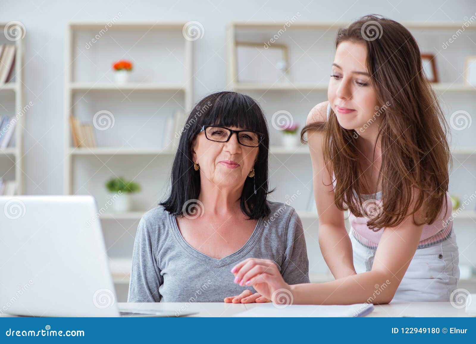 The Daughter Explaining To Mom How To Use Computer Stock Photo - Image ...