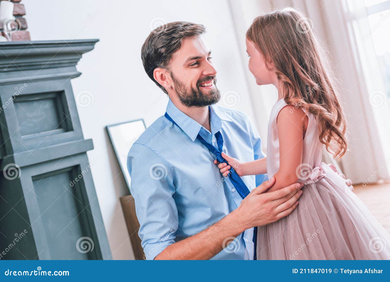 Daughter Helping Dad with Tie Behore Going for a Work Stock Image ...