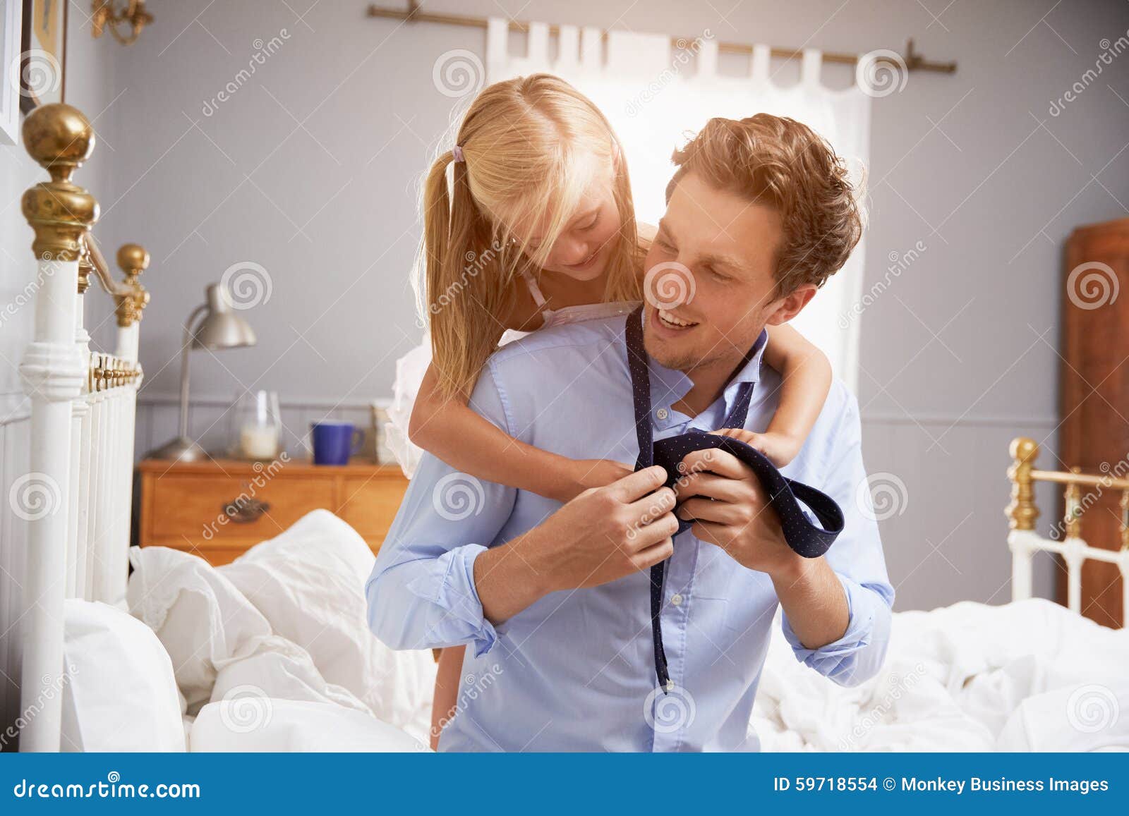 Daughter Helping Father To Get Dressed for Work Stock Photo - Image of ...
