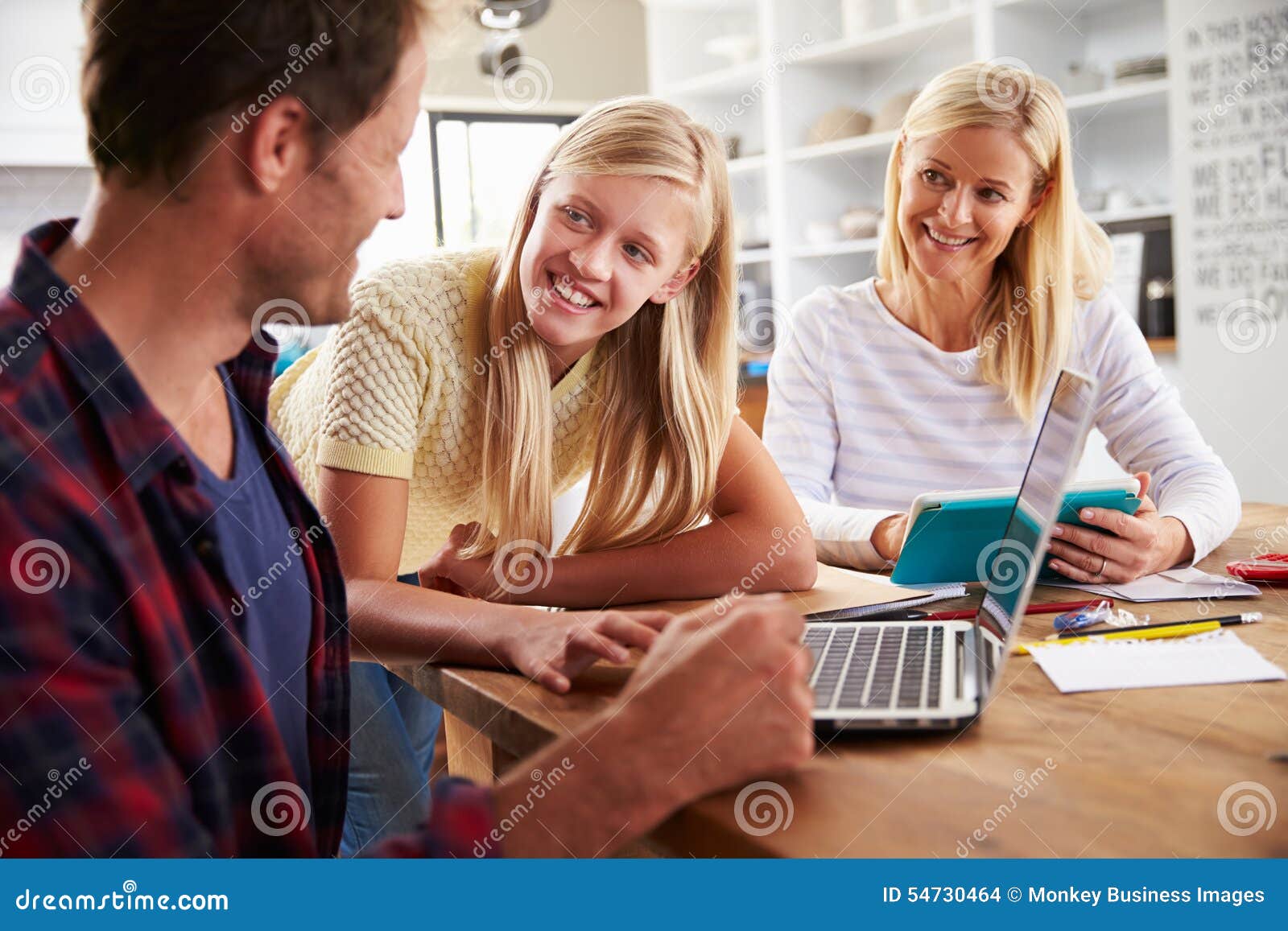 Daughter Helping Her Parents with New Technology Stock Photo - Image of ...