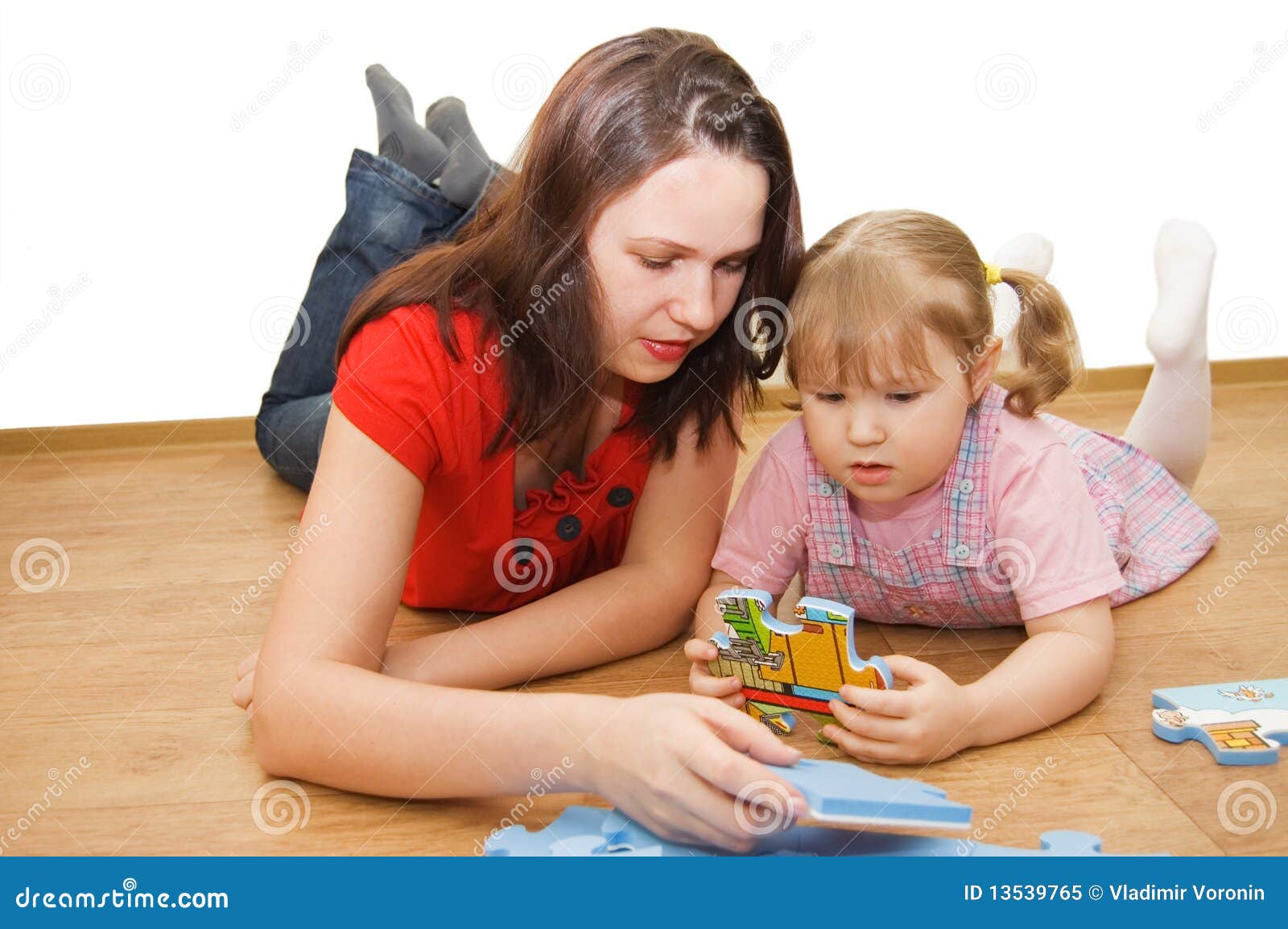 Daughter and Her Mother are Solving Puzzle Stock Image - Image of ...