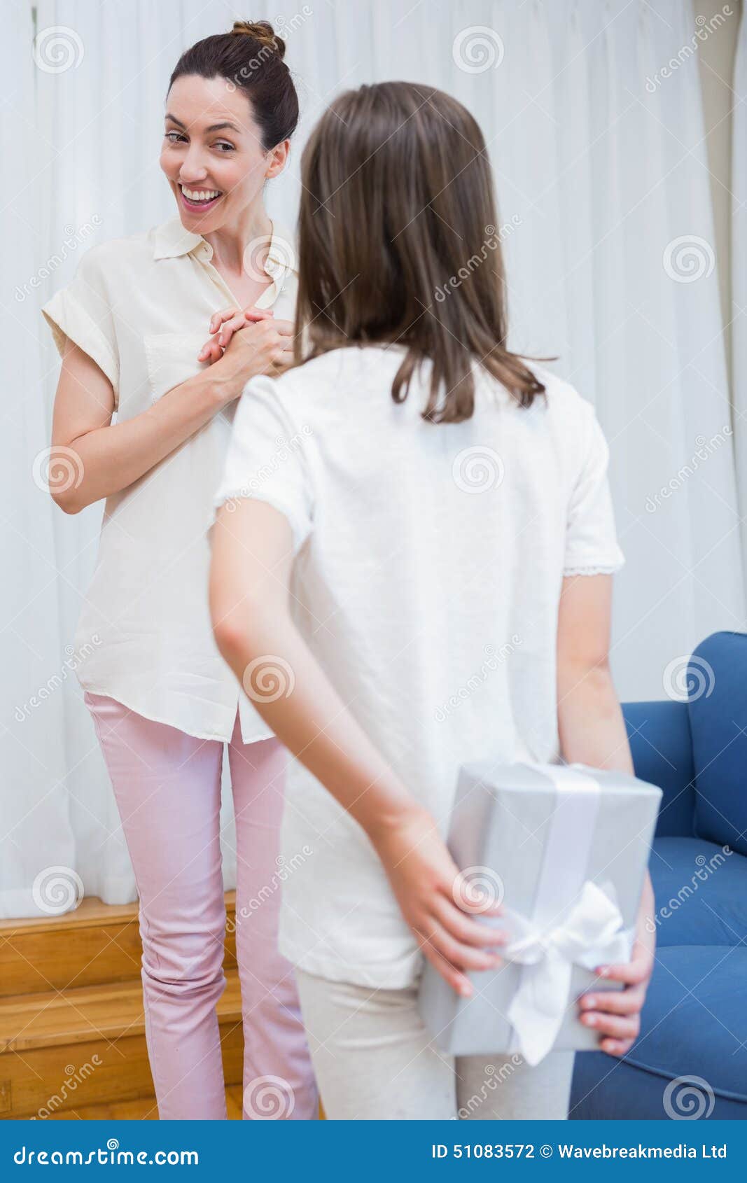 Daughter Hiding Presenting Behind Back Stock Photo - Image of beautiful ...