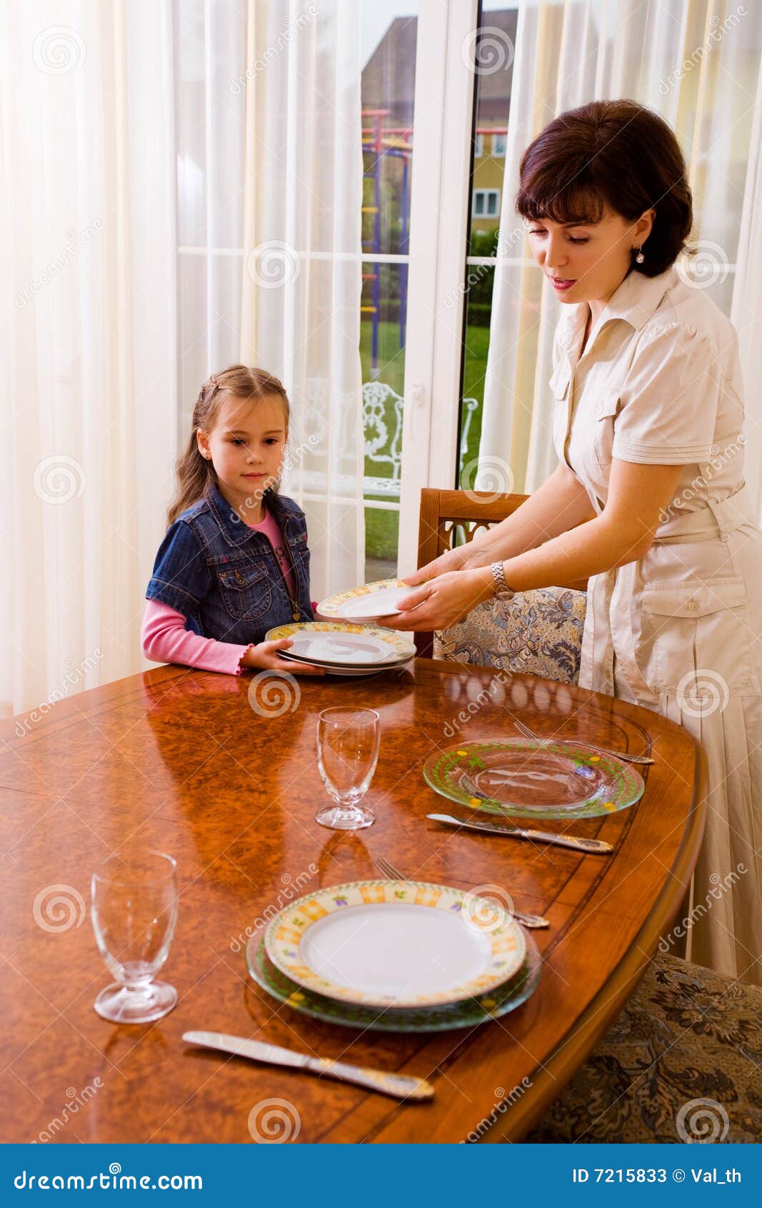 Daughter and Mom Setting the Table Stock Image - Image of lunch, plate ...