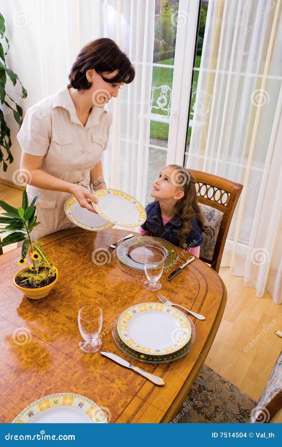 Daughter and Mom Setting the Table Stock Photo - Image of woman, meal ...