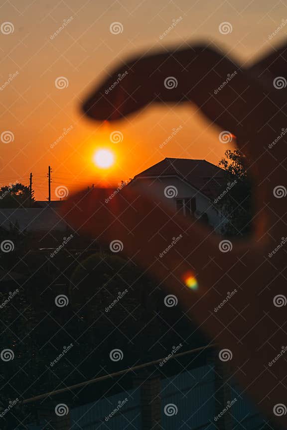 Dawn in hand stock photo. Image of dawn, night, sunset - 190983320
