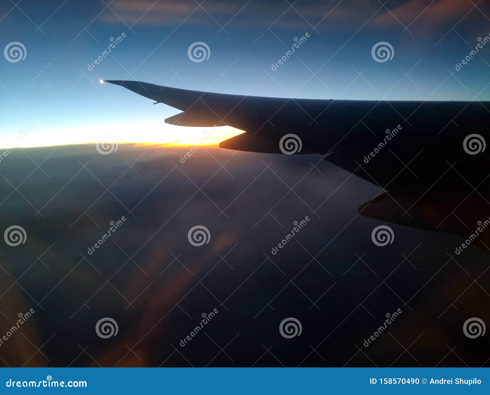 Dawn of the Sun in the Window of an Airplane Stock Photo - Image of ...
