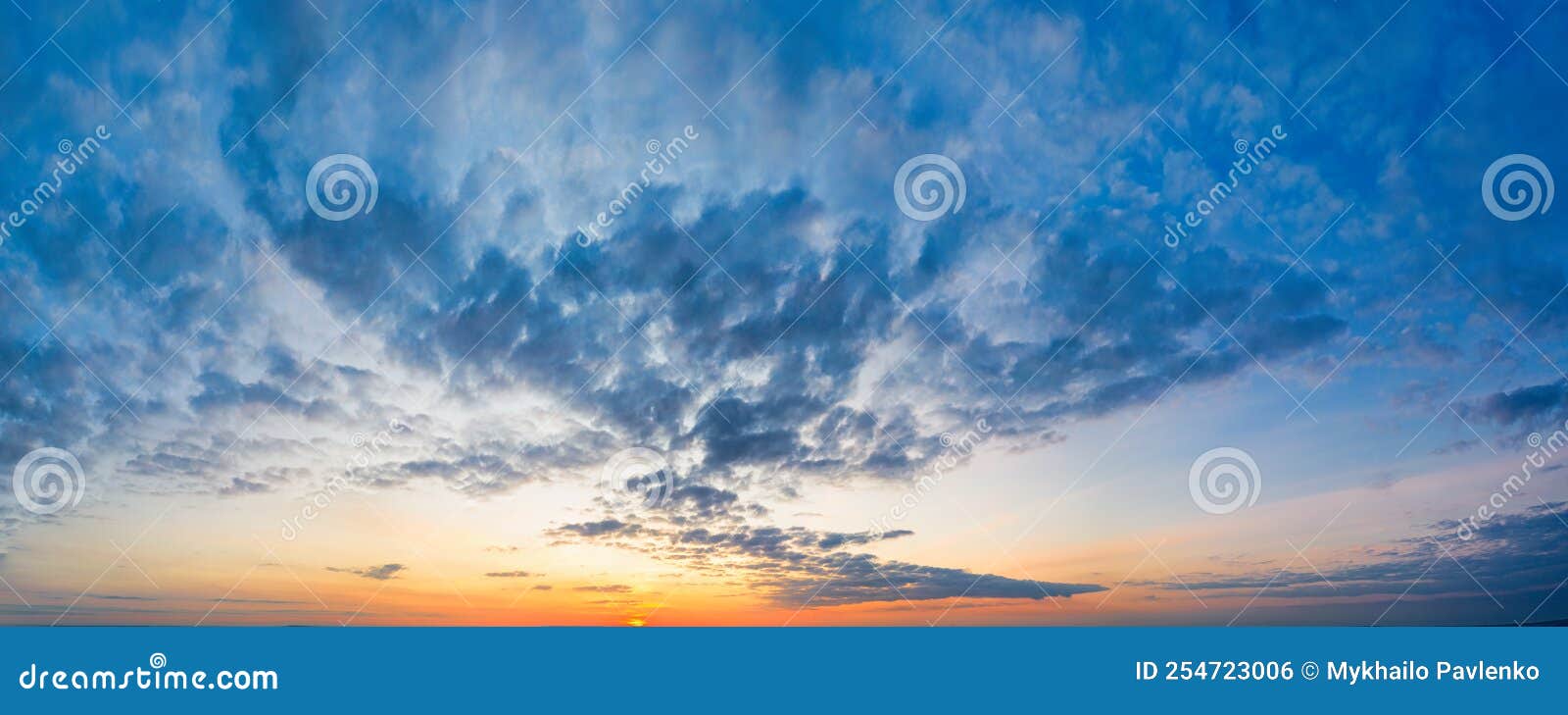 Dawn or Sunset. Pink Clouds on the Background of the Blue Sky Stock ...