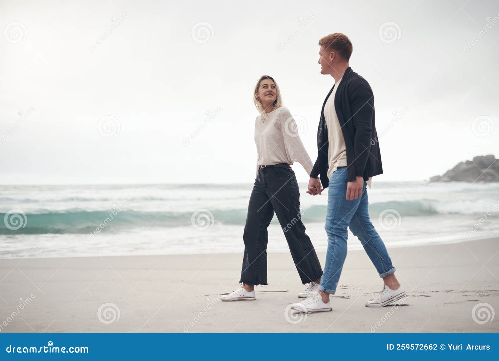 A Day at the Beach is Just What we Needed. a Couple Holding Hands while ...