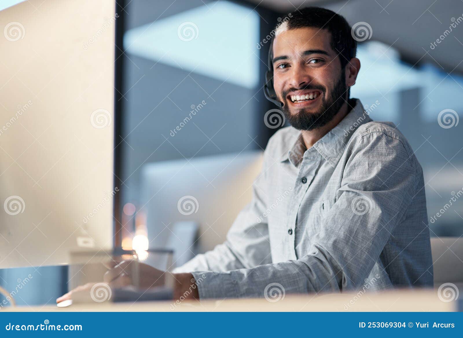 Day or Night, Ill Make Things Right. a Young Man Using a Headset and ...