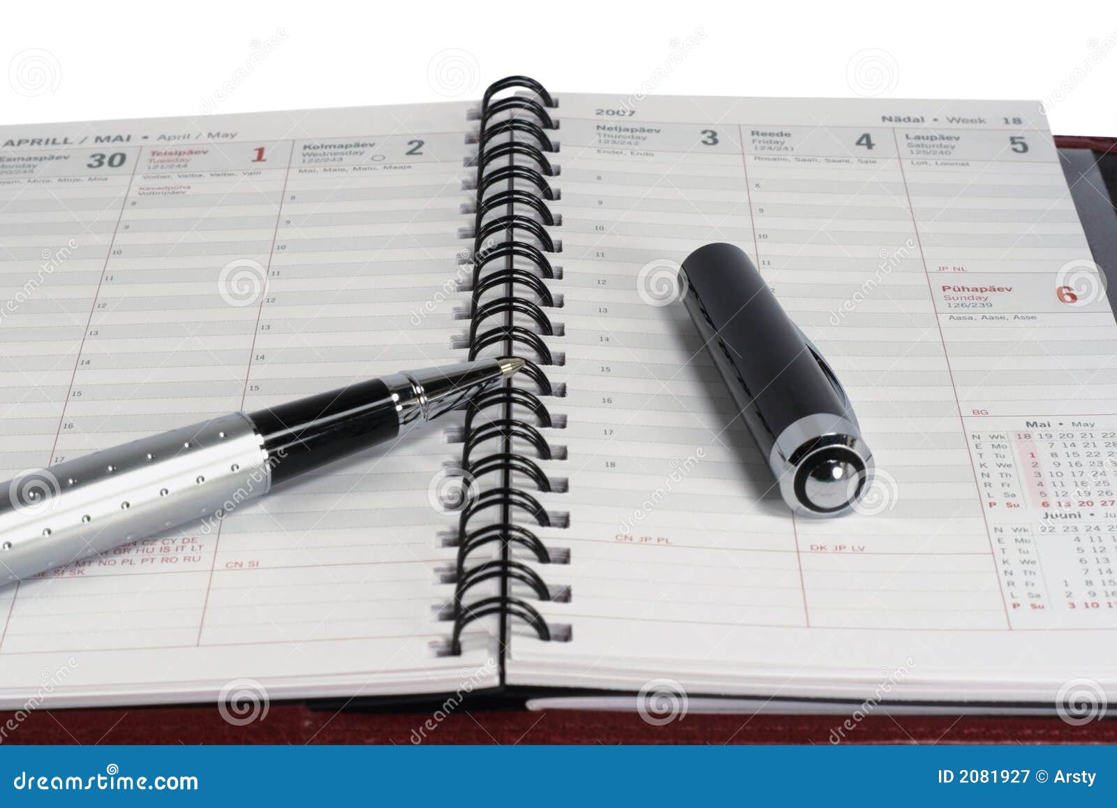 Day planner & pen - 2 stock image. Image of organizer - 2081927