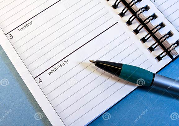 Day planner with pen stock photo. Image of office, blue - 22323342