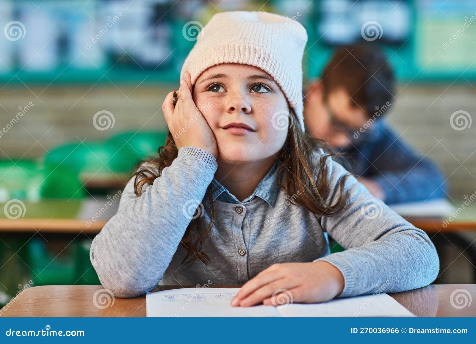 Daydreaming in Class. an Elementary School Girl Daydreaming in the ...
