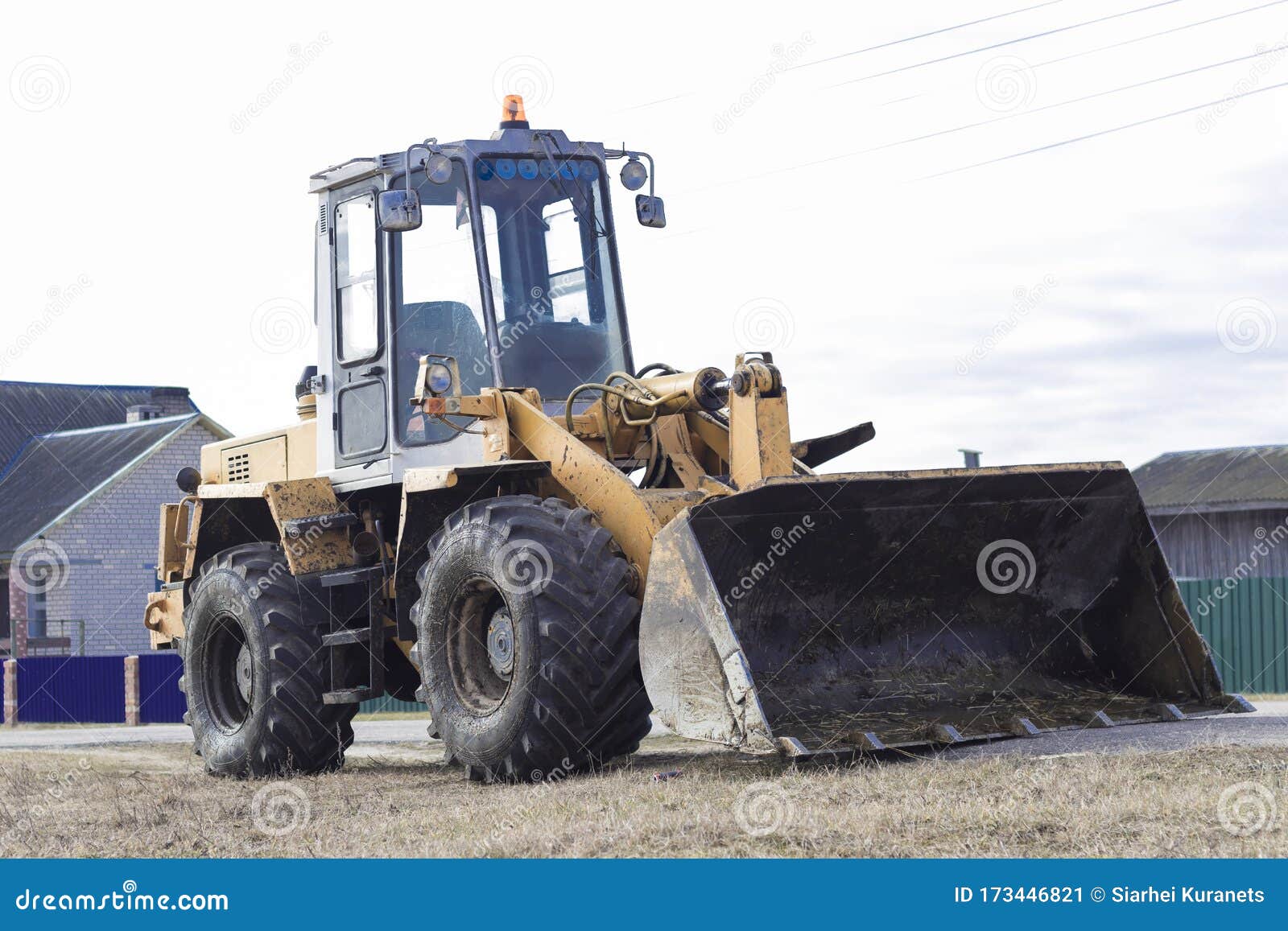 Daylight Yellow Loader with a Bucket. There is a Tint Stock Image ...
