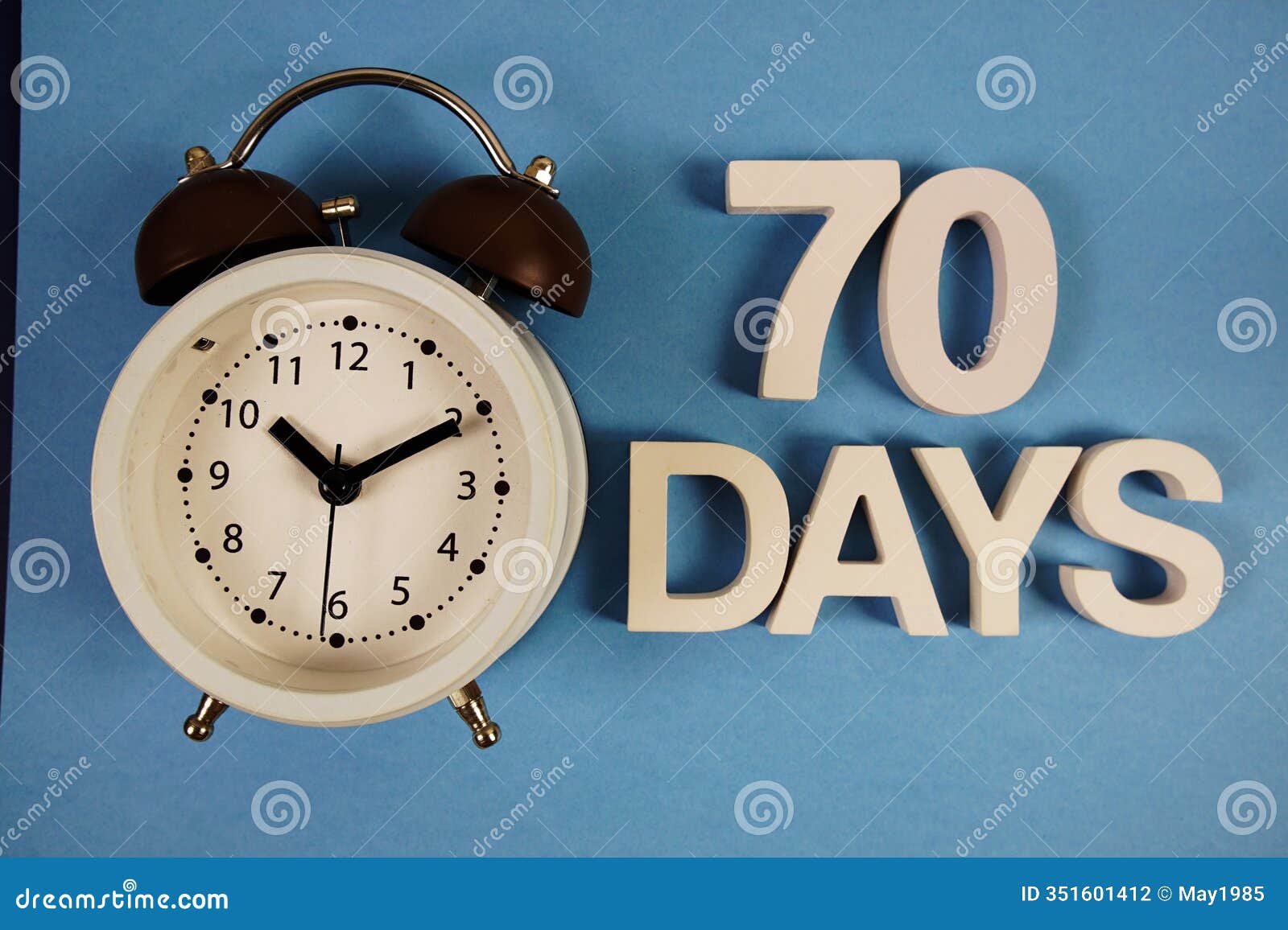 70 Days Alphabet Letters with Alarm Clock on Blue Background Stock ...